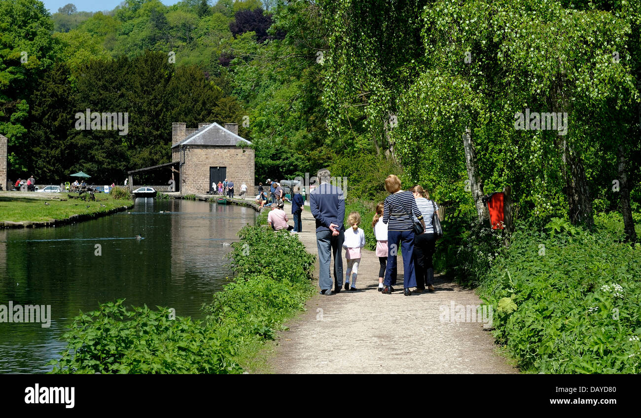 A family walking along the Cromford canal Derbyshire England uk Stock ...