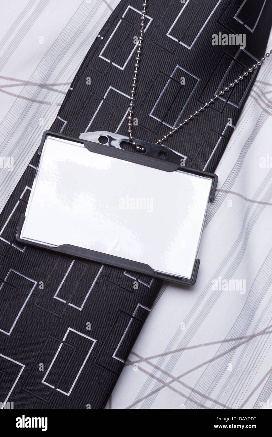Card empty ID badge on man suit Stock Photo - Alamy