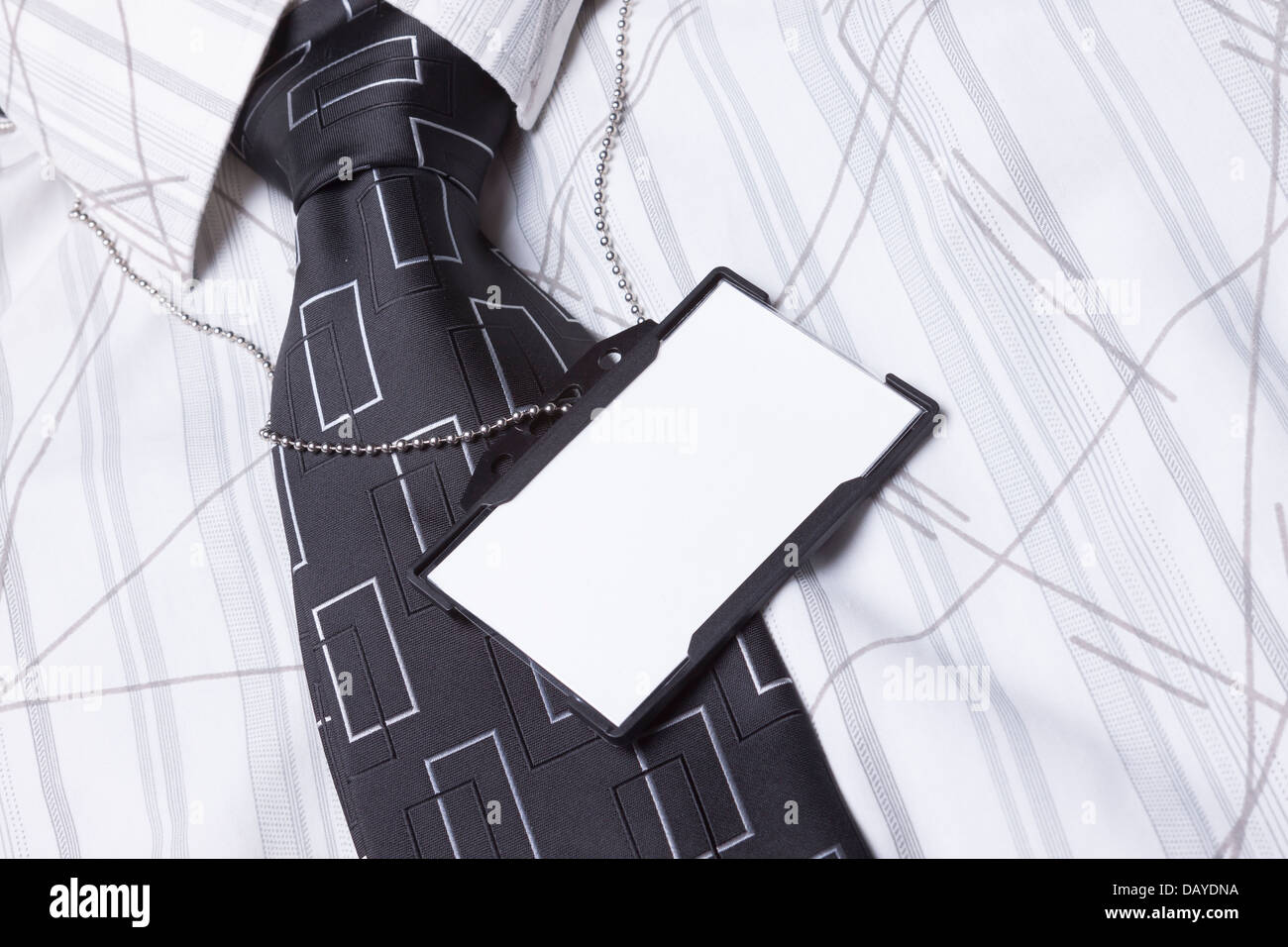 Card empty ID badge on man suit Stock Photo - Alamy