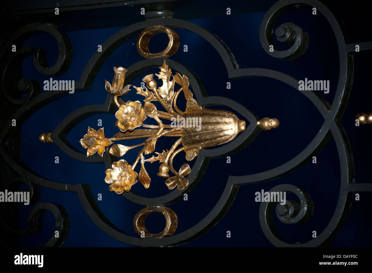 Kensington Palace gates with close ups of the gold leaf motifs on the ...