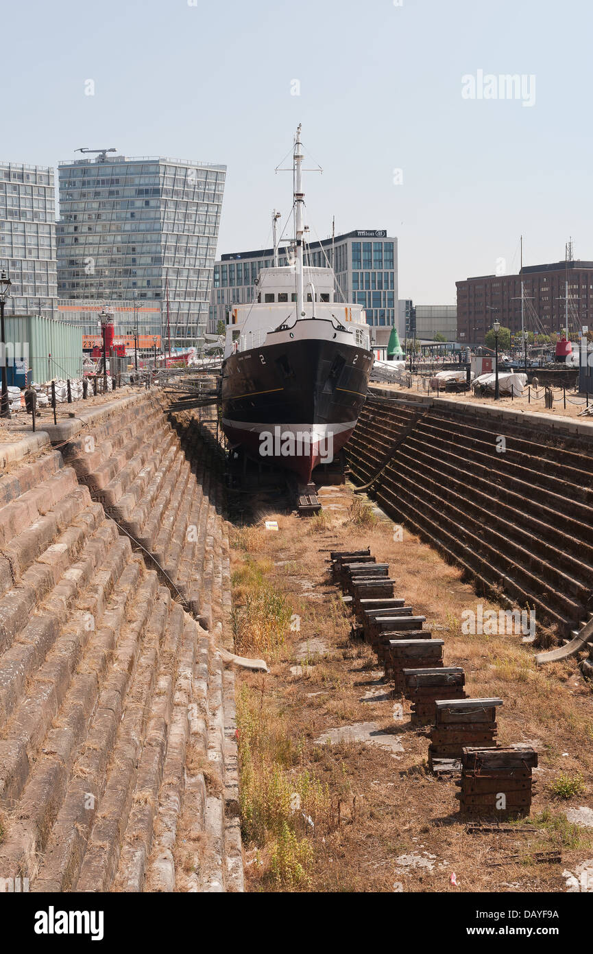 trading sailing ship boat in Canning dry dock against modern rebuild ...