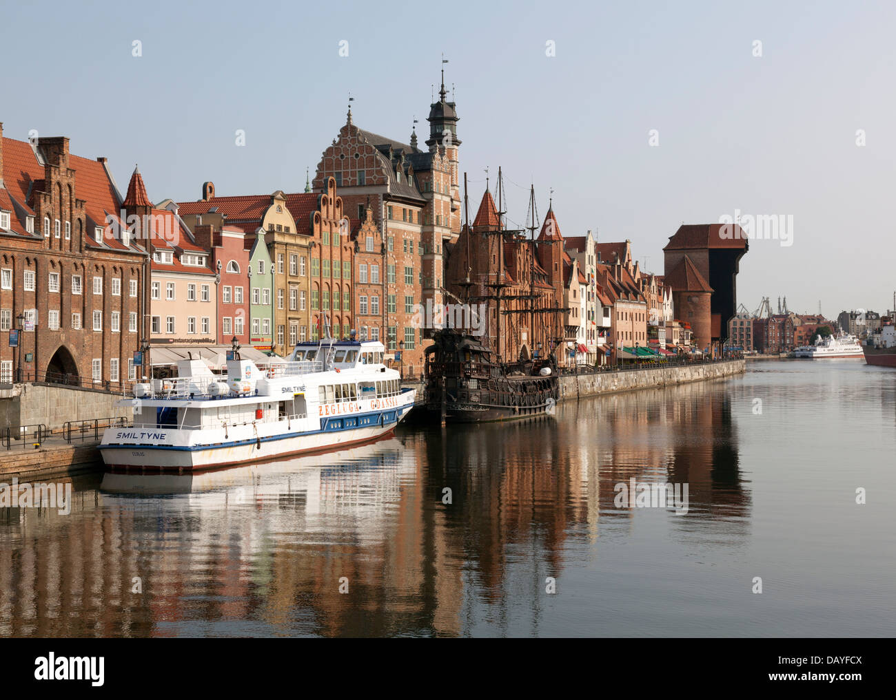 Old town waterfront over Motlawa river in Gdansk, Poland Stock Photo ...