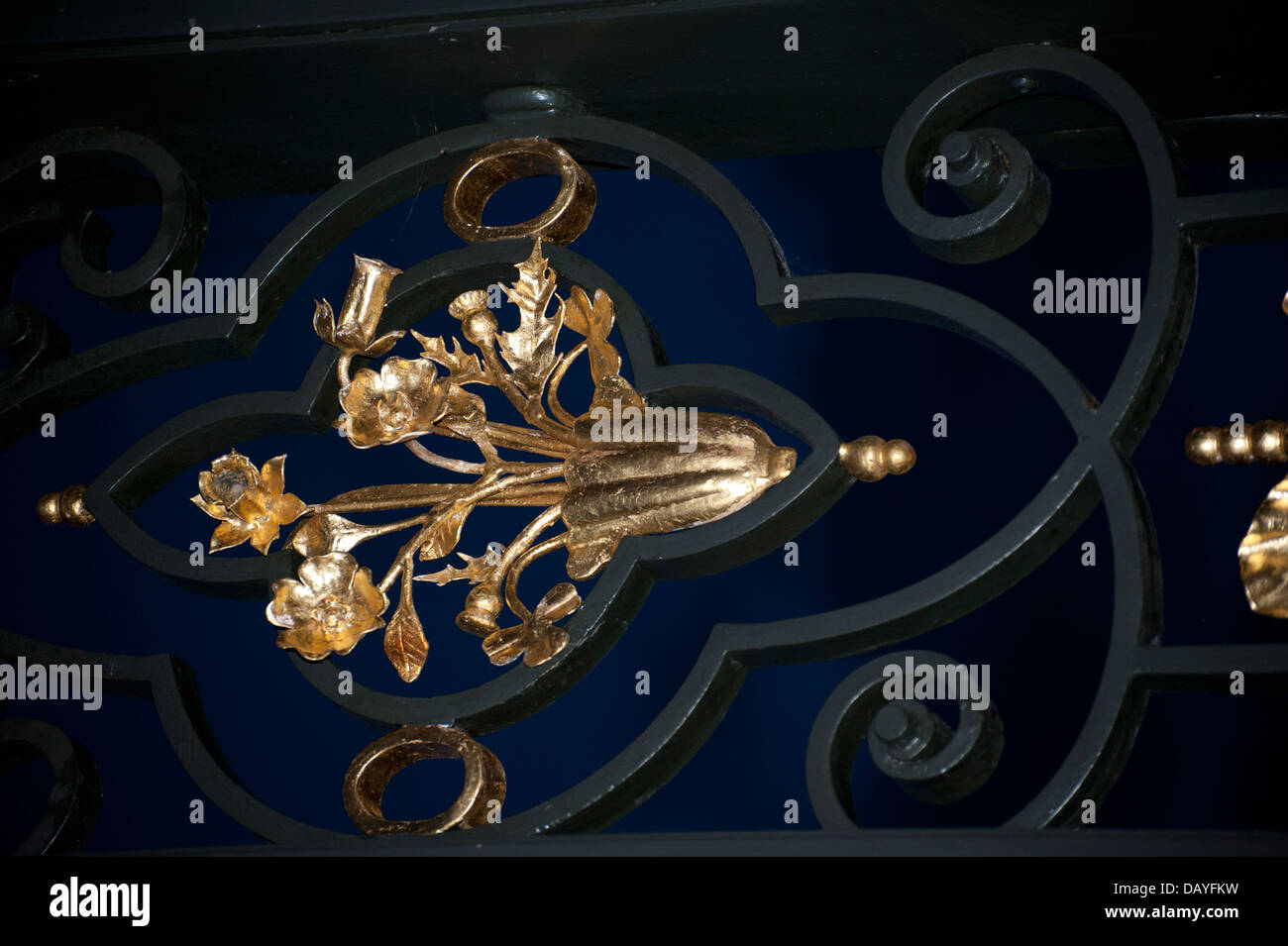 Kensington Palace gates with close ups of the gold leaf motifs on the ...