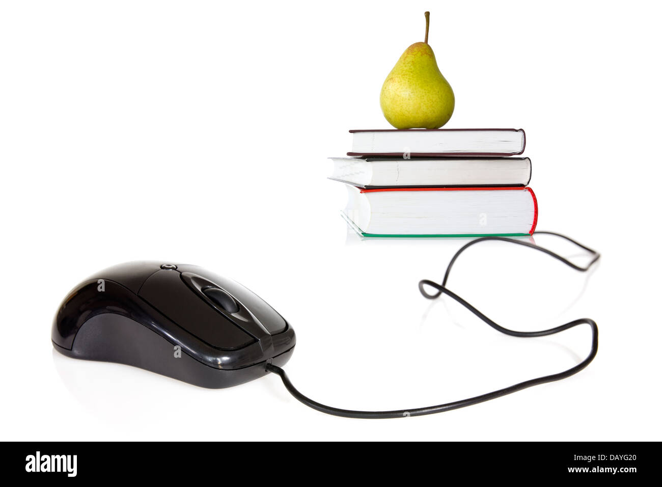Internet education concept. Books and computer mouse over a white ...