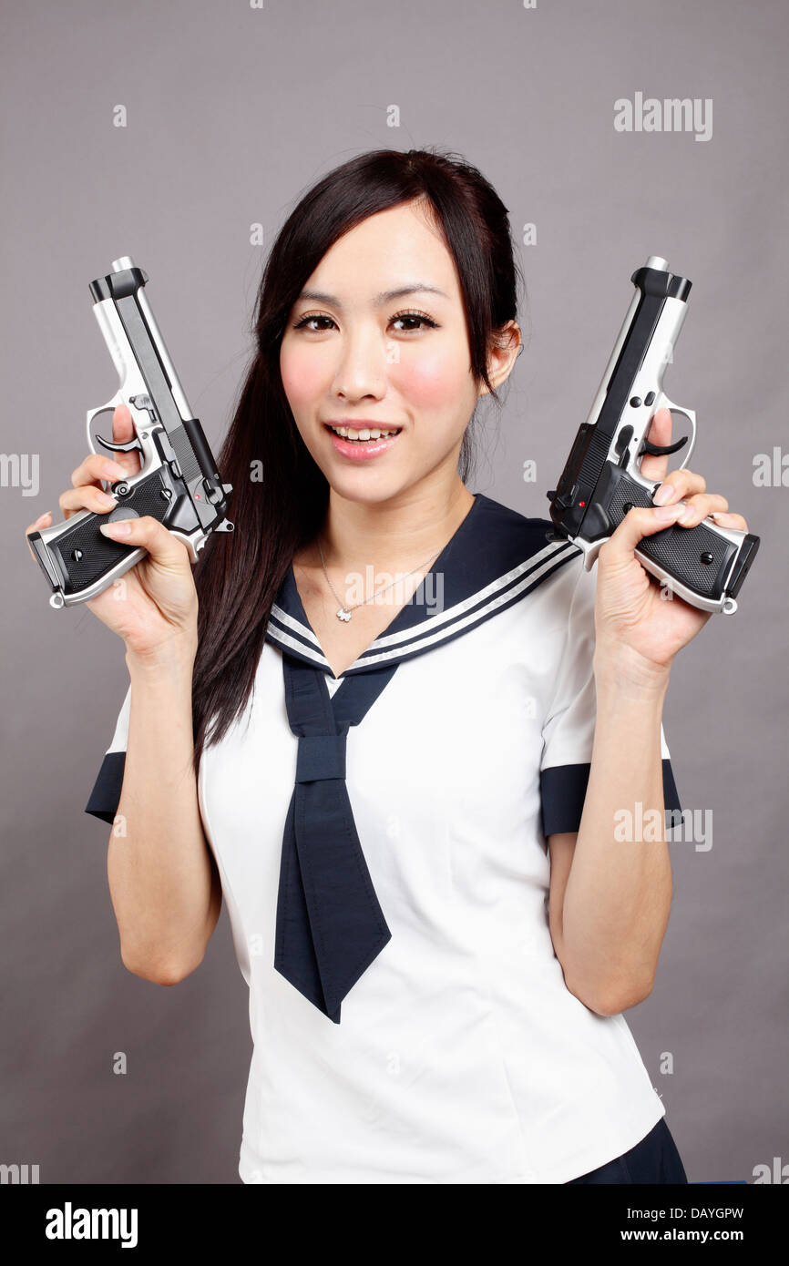 School girl plays gun hi-res stock photography and images - Alamy
