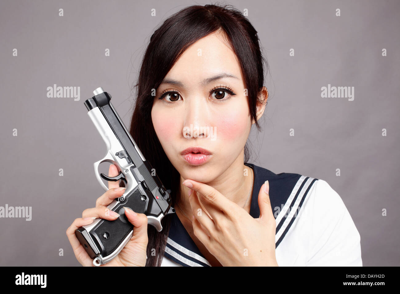 School girl plays gun hi-res stock photography and images - Alamy