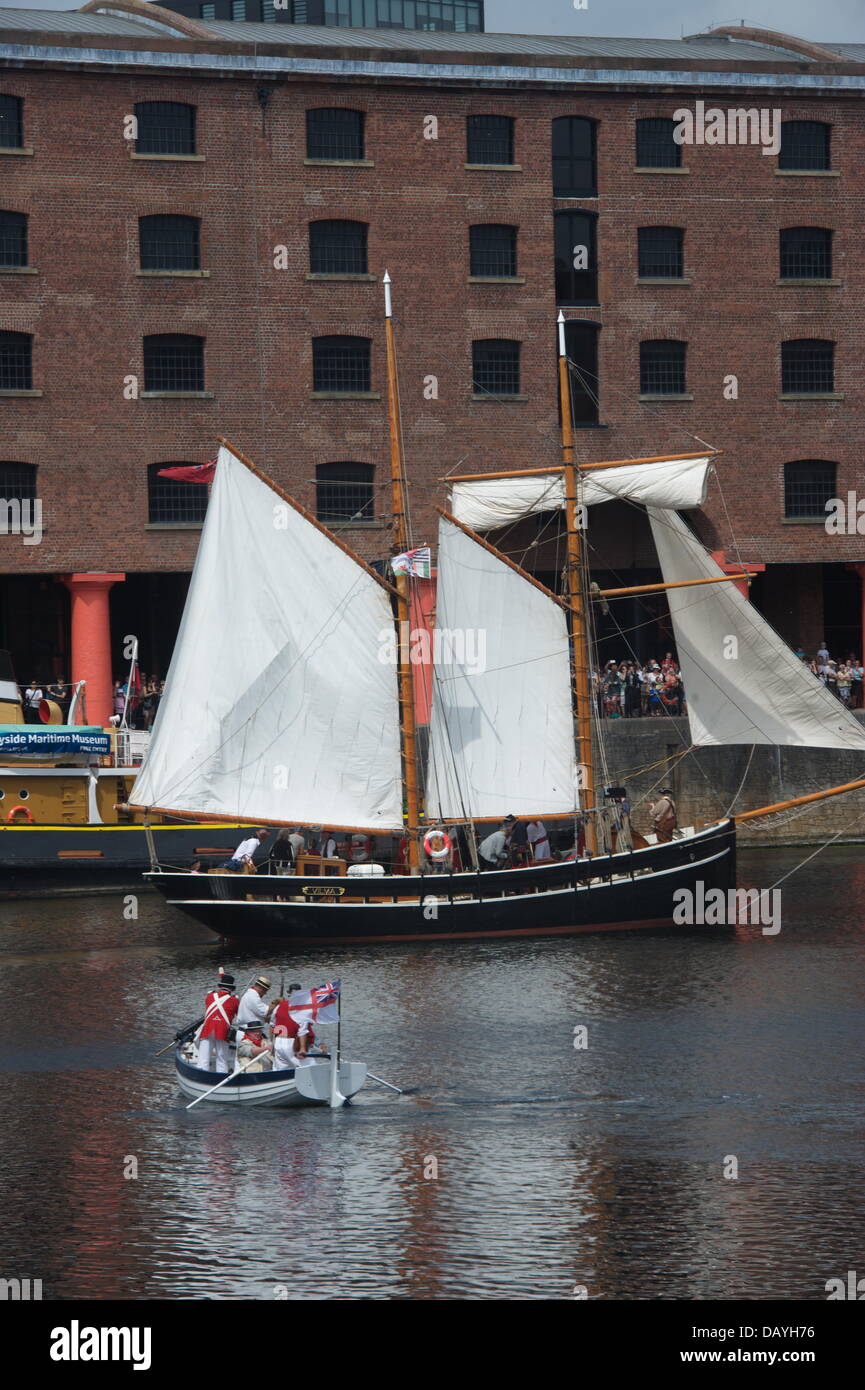 Liverpool, UK. 20th July, 2013. Live action cannon battle between the ...