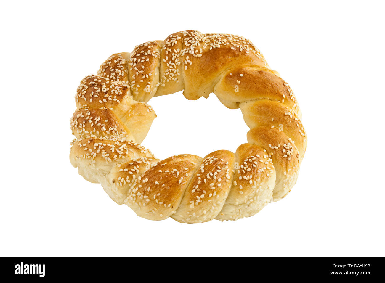 Pretzel with sesame seeds in a round shape isolated with clipping path ...