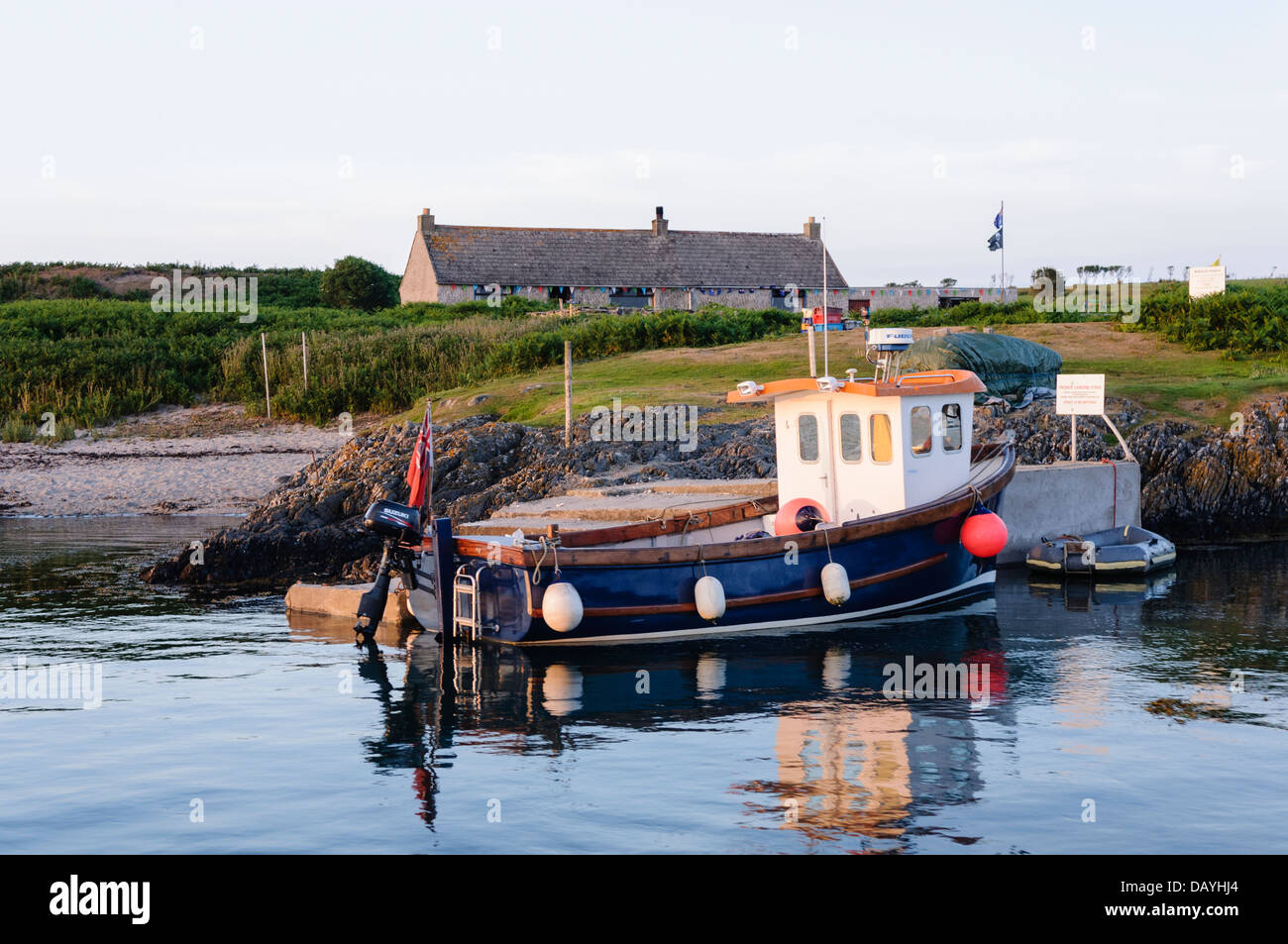 Boat tied up at a private landing stage on the Copeland Island ... Boat tied up at a private landing stage on the Copeland Island ...