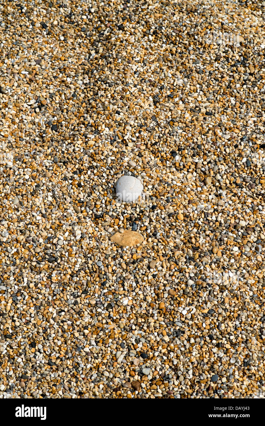 Smooth stone pebble on shingle beach UK Stock Photo - Alamy