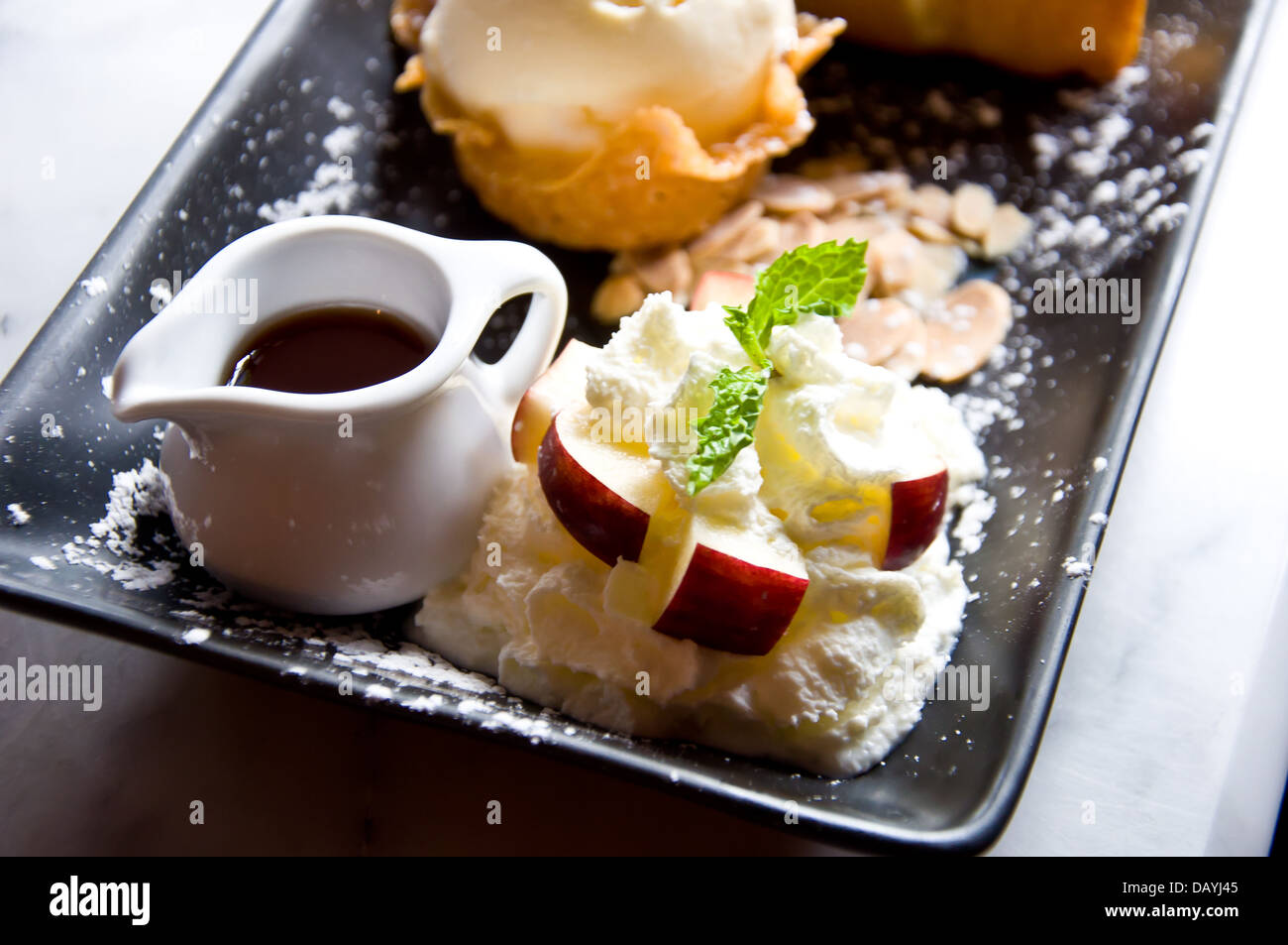 whip cream and apple for ice cream Stock Photo - Alamy