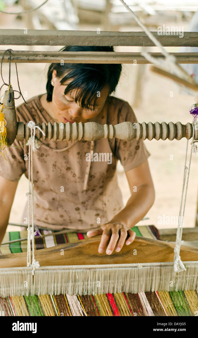 Woman weaving a rug in Bagan ,Burma Stock Photo - Alamy