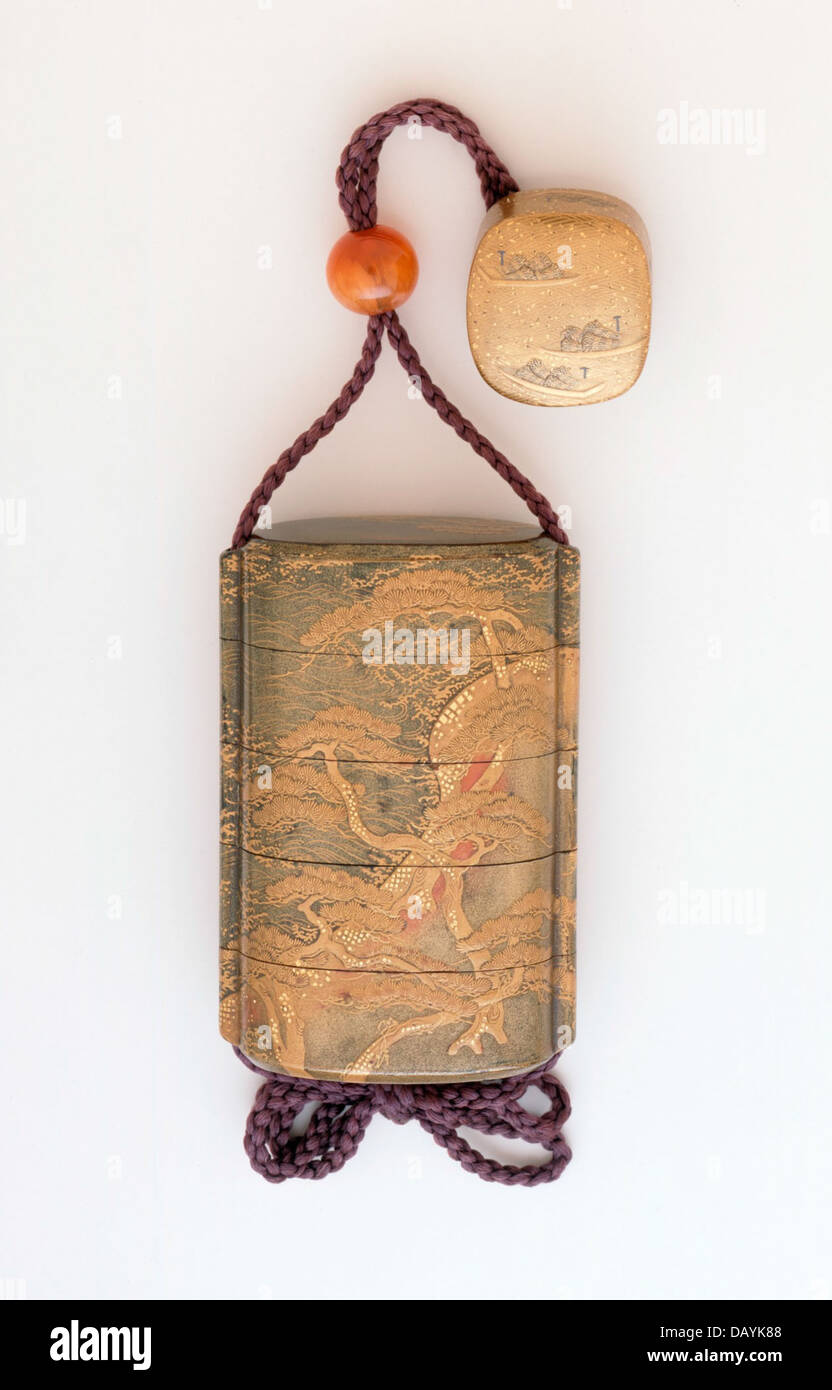 This set of inro, ojime, and netsuke represents traditional Japanese ...