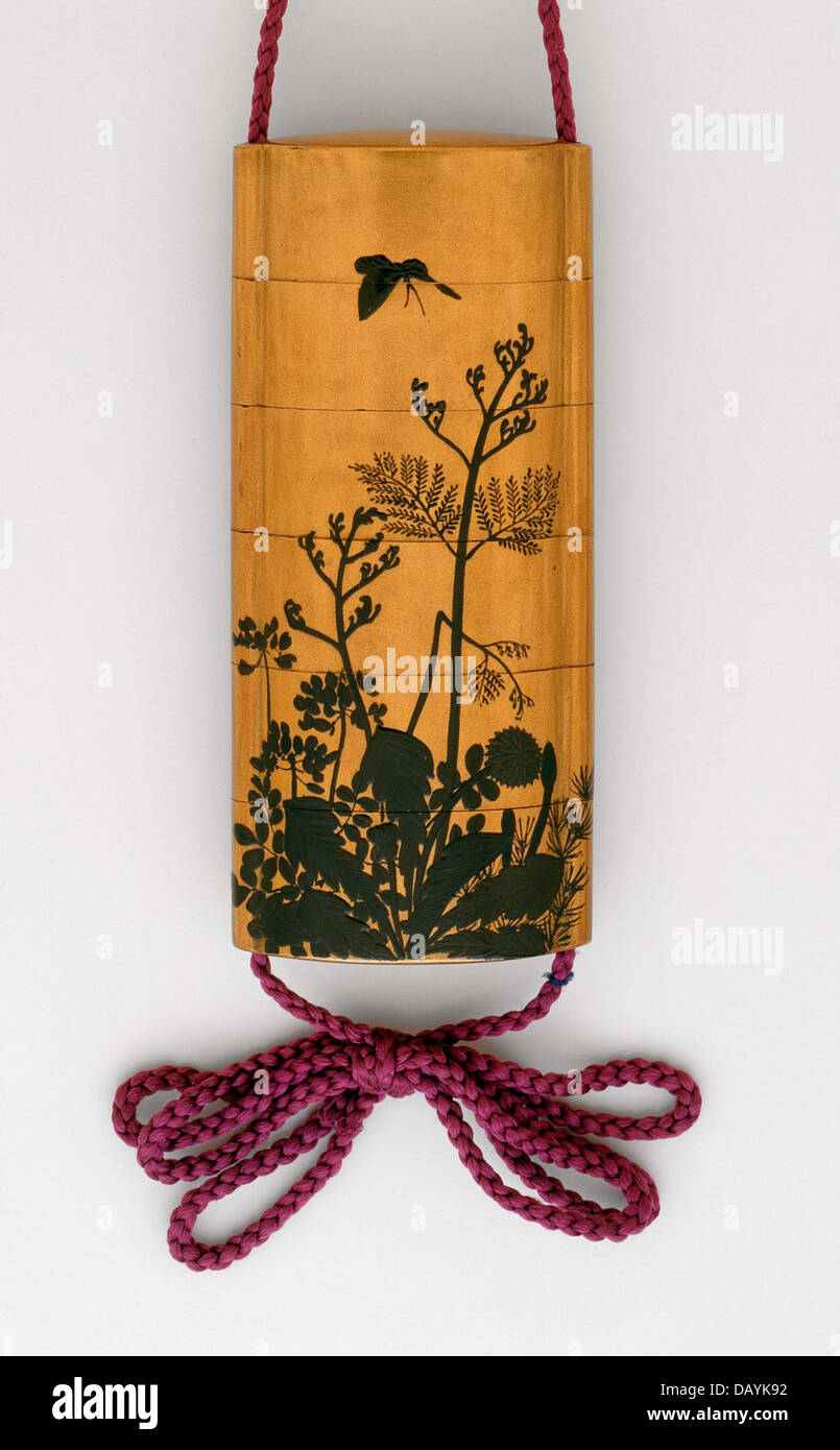 A collection of traditional Japanese accessories, including an inro ...