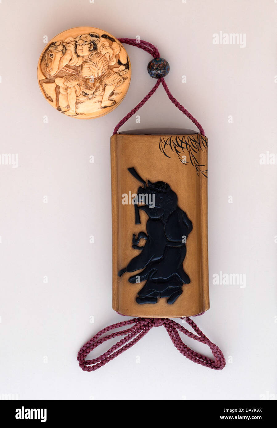 A collection of traditional Japanese accessories including an inro ...