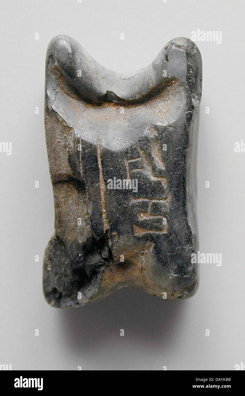 This inscribed knucklebone, a type of bone used in ancient games ...