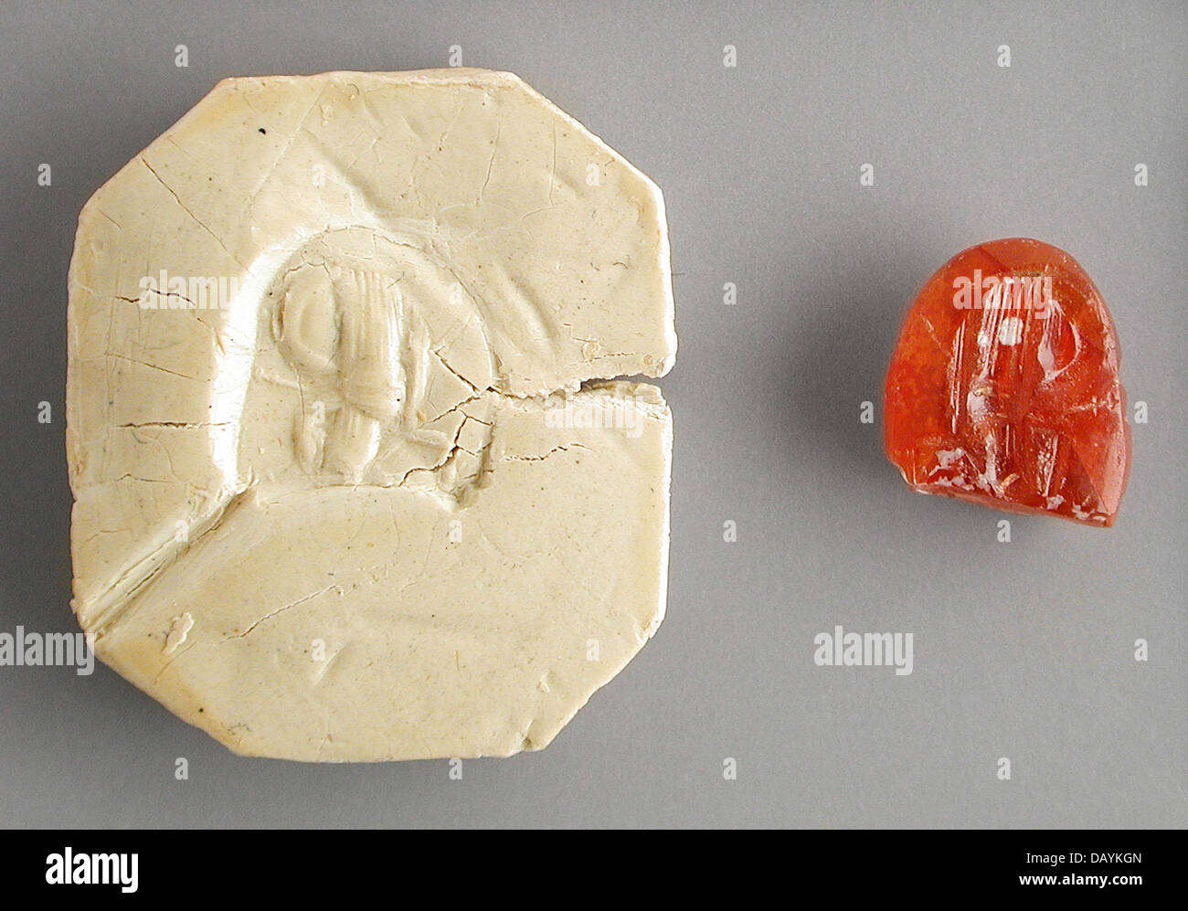 This intaglio features intricate carvings, often used for seals or ...