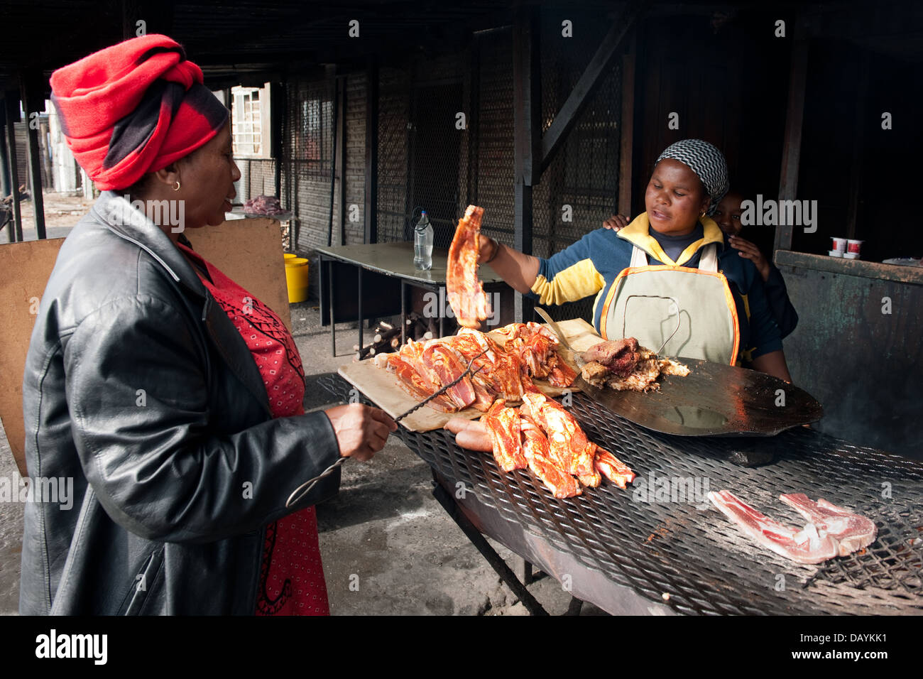 Roadside store selling grilled meat, Khayelitsha township, Cape Town ...