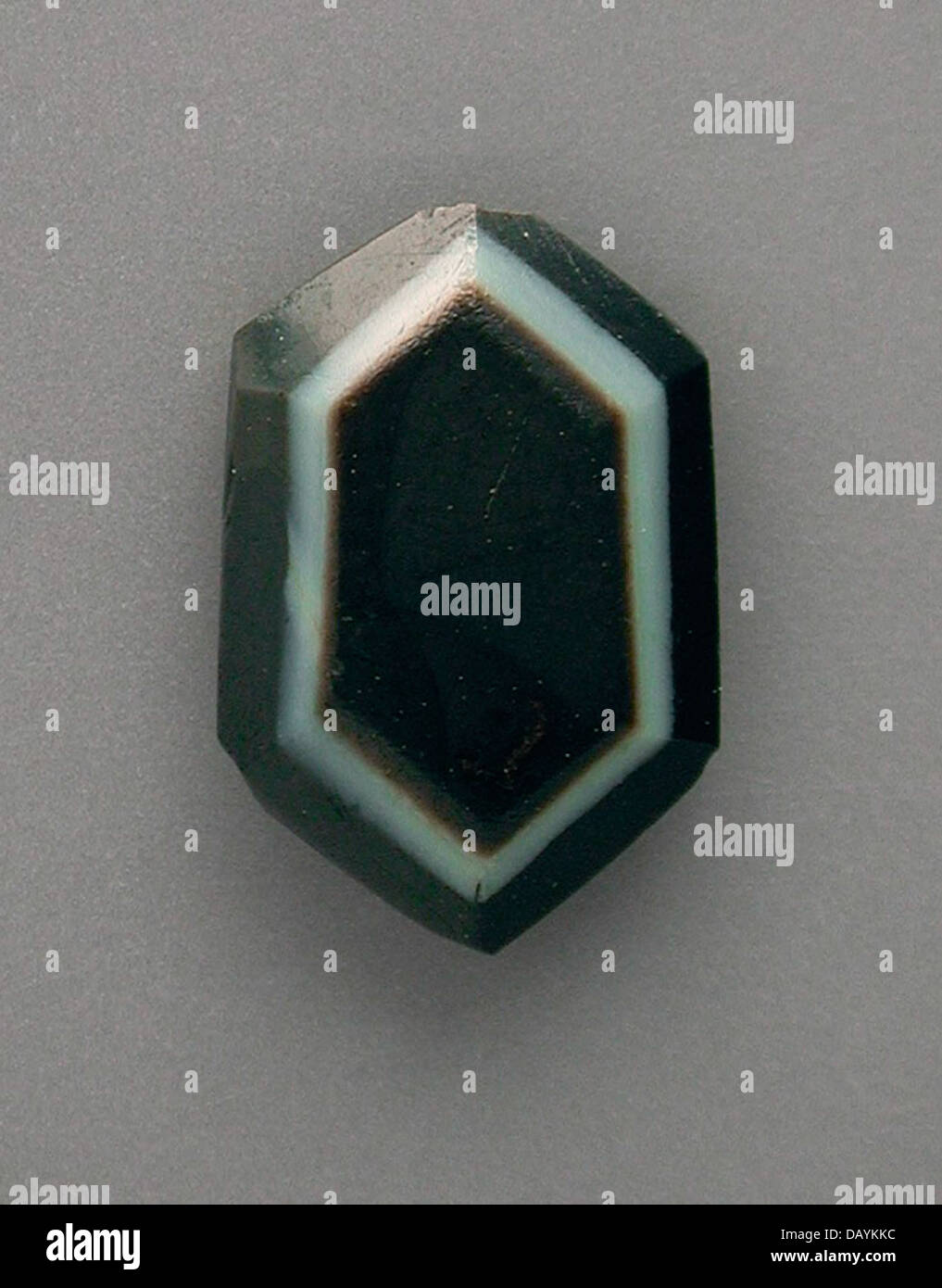 This intaglio, featuring detailed engraving, was likely used to make ...