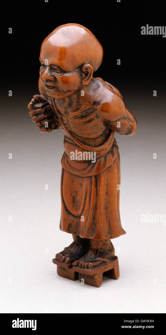 This sculpture depicts an itinerant priest, capturing the figure of a ...