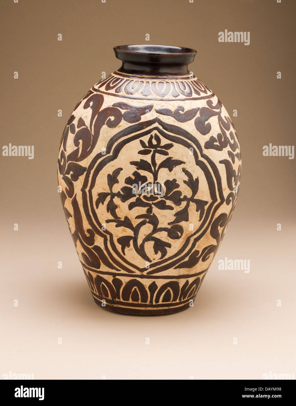 A ceramic jar featuring peony sprays and lotus scrolls, demonstrating ...