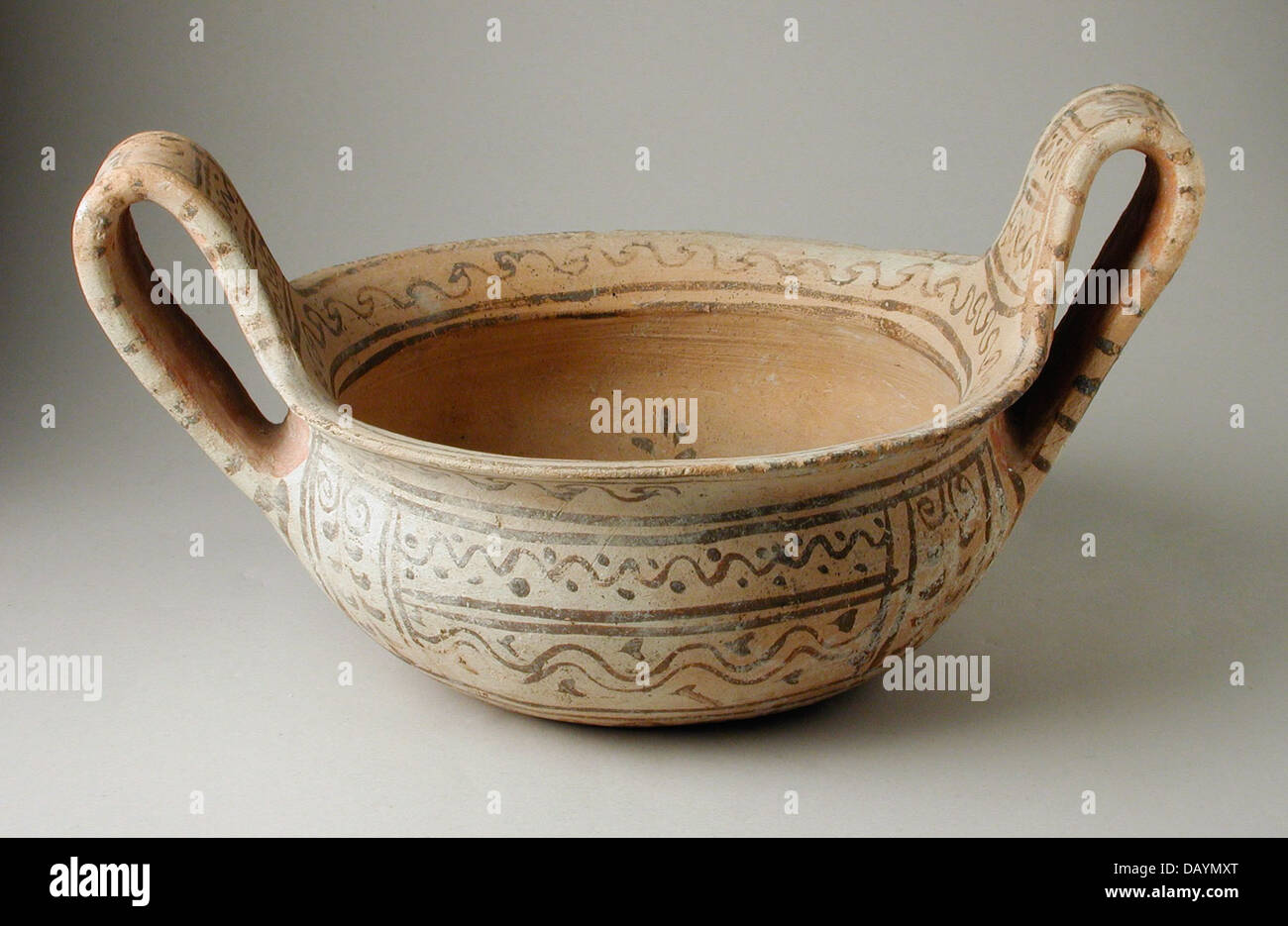 A kantharos, an ancient Greek drinking cup, made of bronze. Its design ...