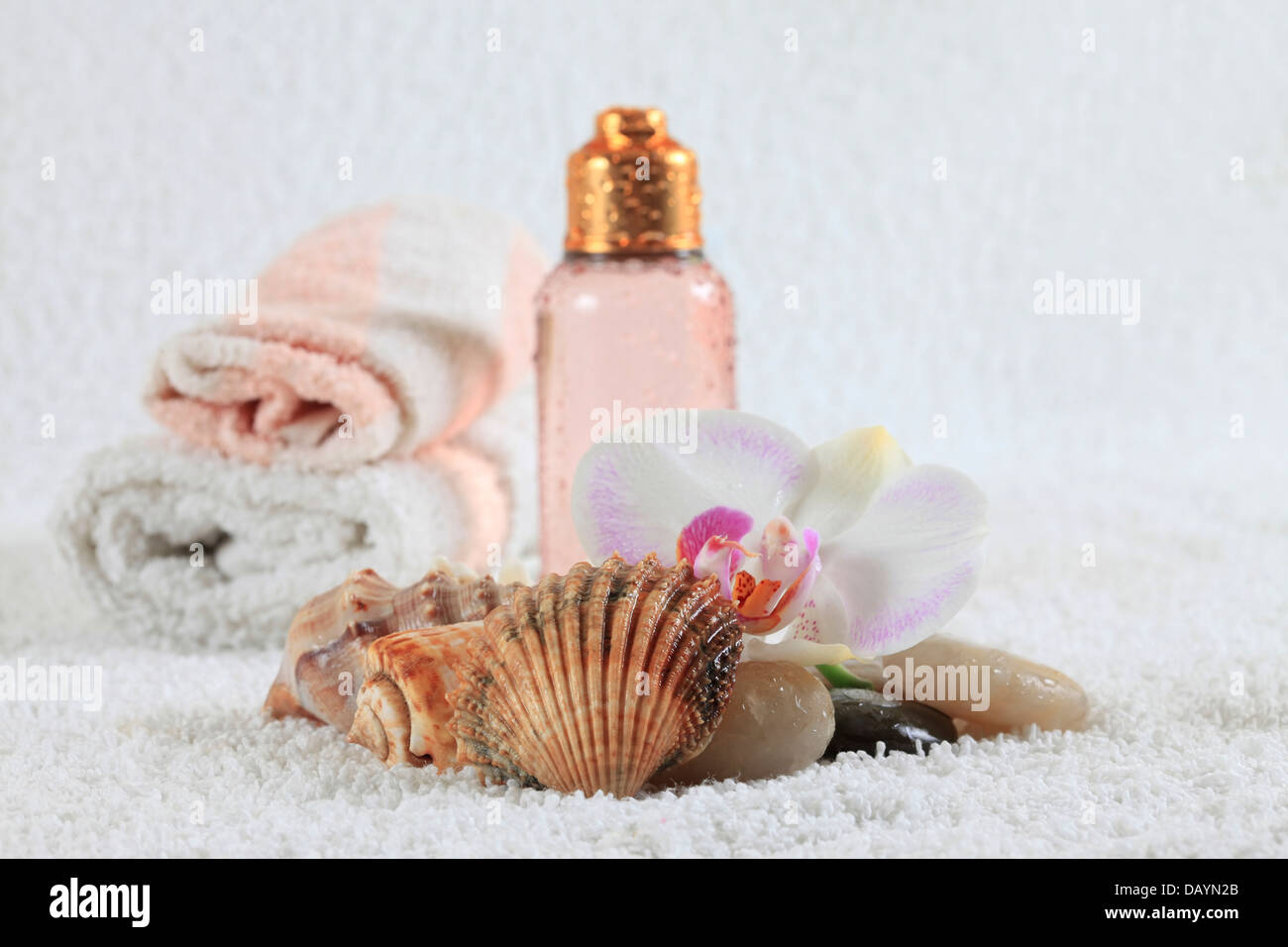 Body care products and a beautiful orchid Stock Photo - Alamy