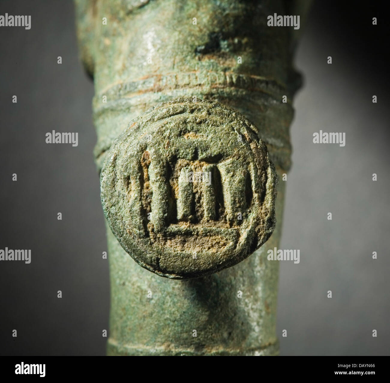 A bronze knife featuring a seal, part of a collection of Egyptian and ...