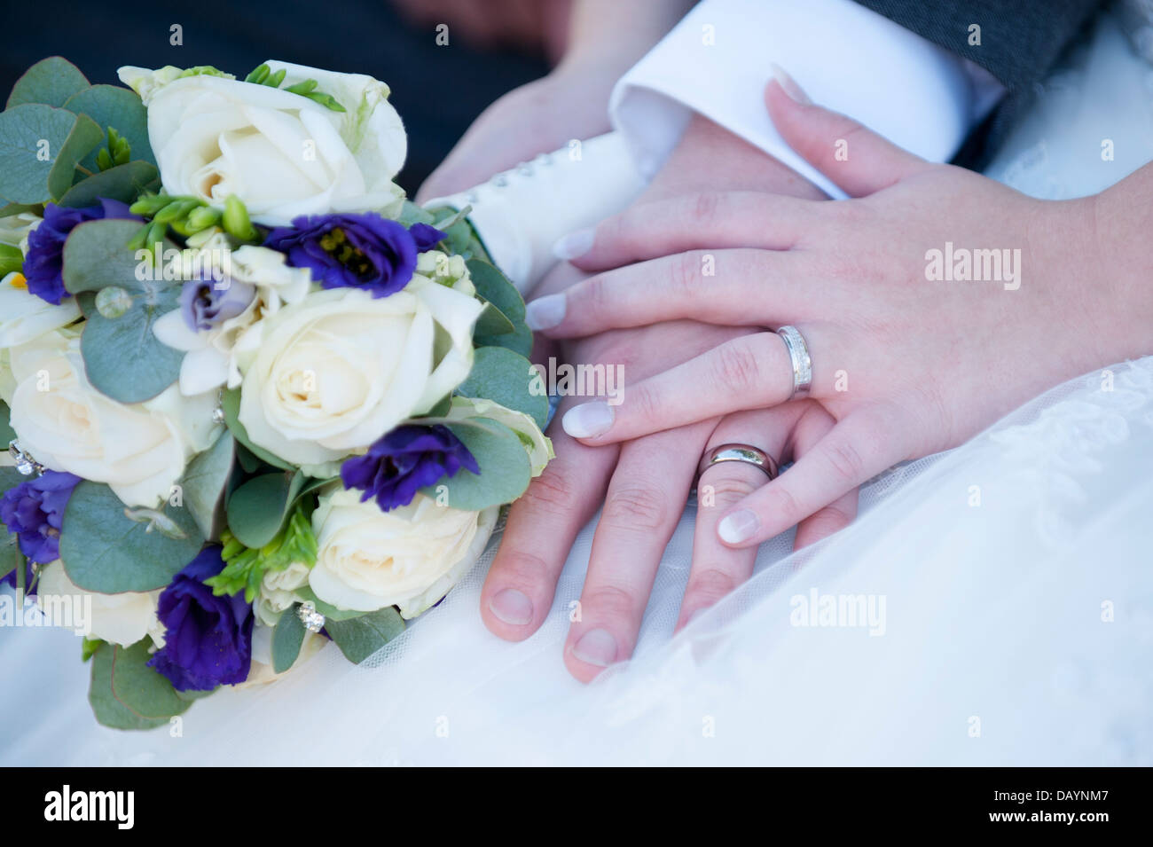 Newly weds hold hands Stock Photo - Alamy