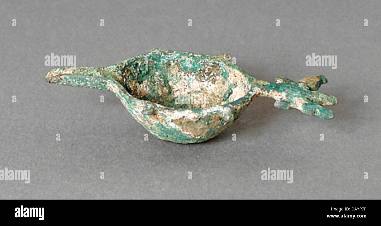 This object, which functions as both a lamp and inkstand, combines ...