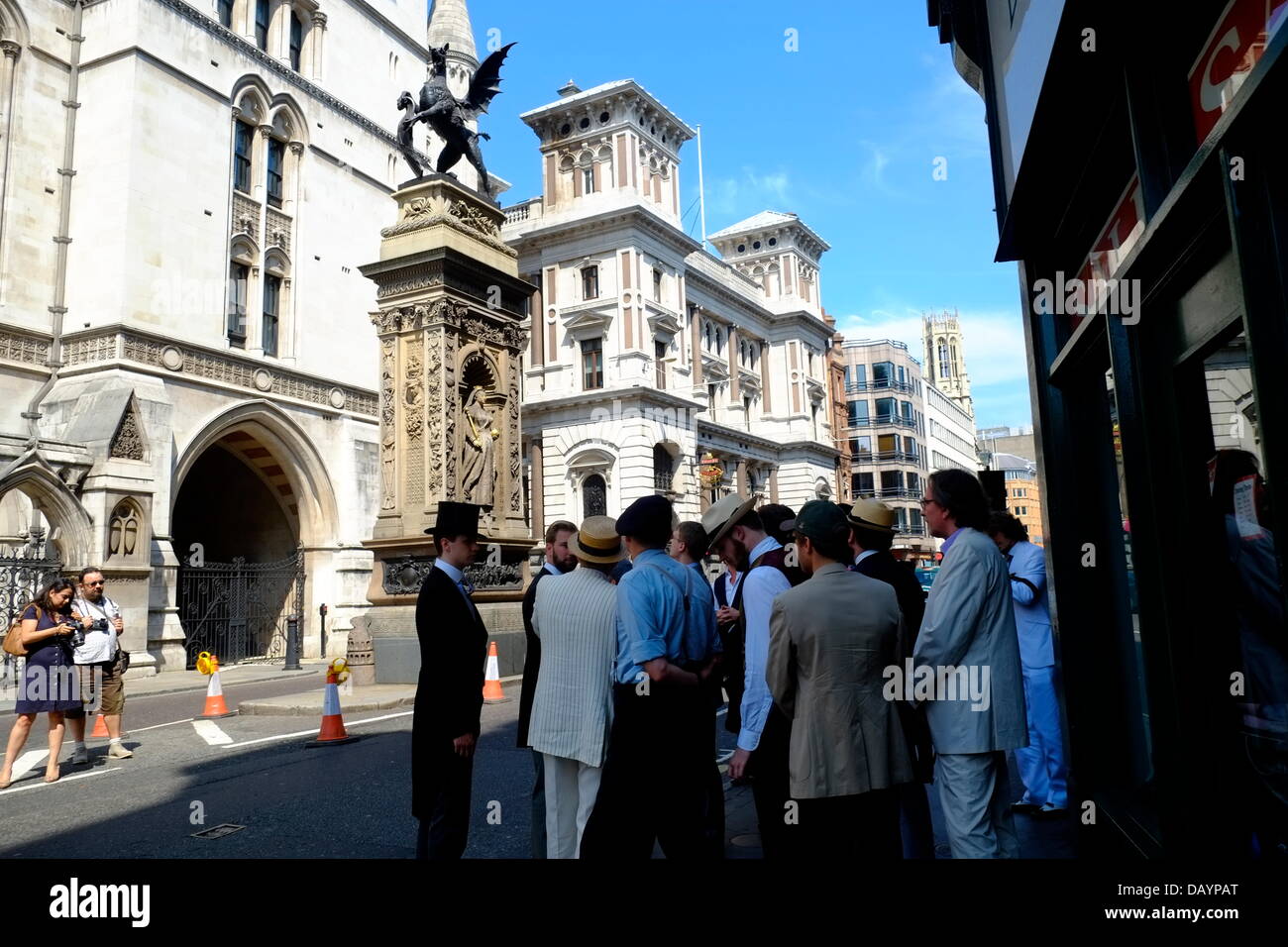 London, UK. 21st July, 2012. A group of stylish men took to the streets ...