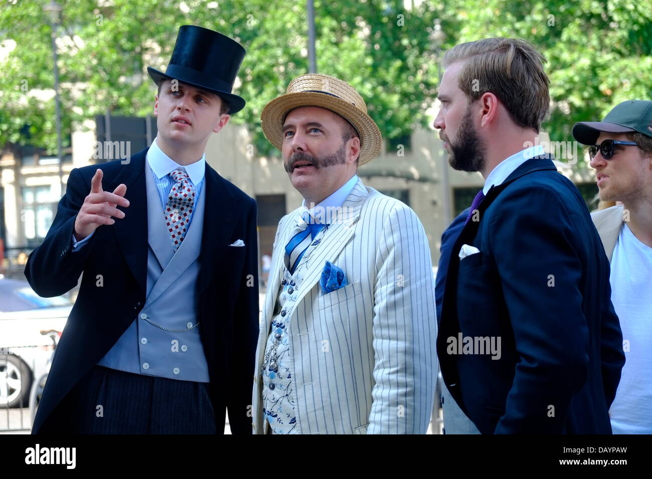 London, UK. 21st July, 2012. A group of stylish men took to the streets ...