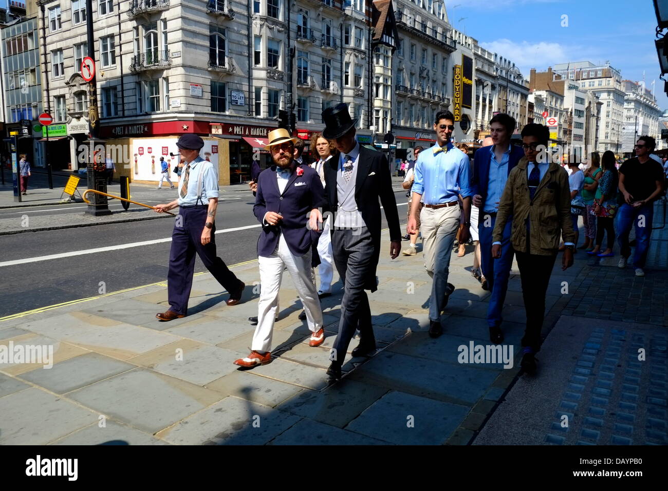 London, UK. 21st July, 2012. A group of stylish men took to the streets ...