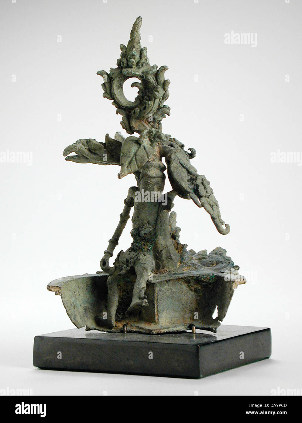 This lamp features a sculptural representation of a boy, crafted from ...