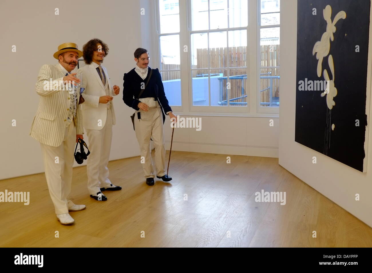 London, UK. 21st July, 2012. A group of stylish men took to the streets ...