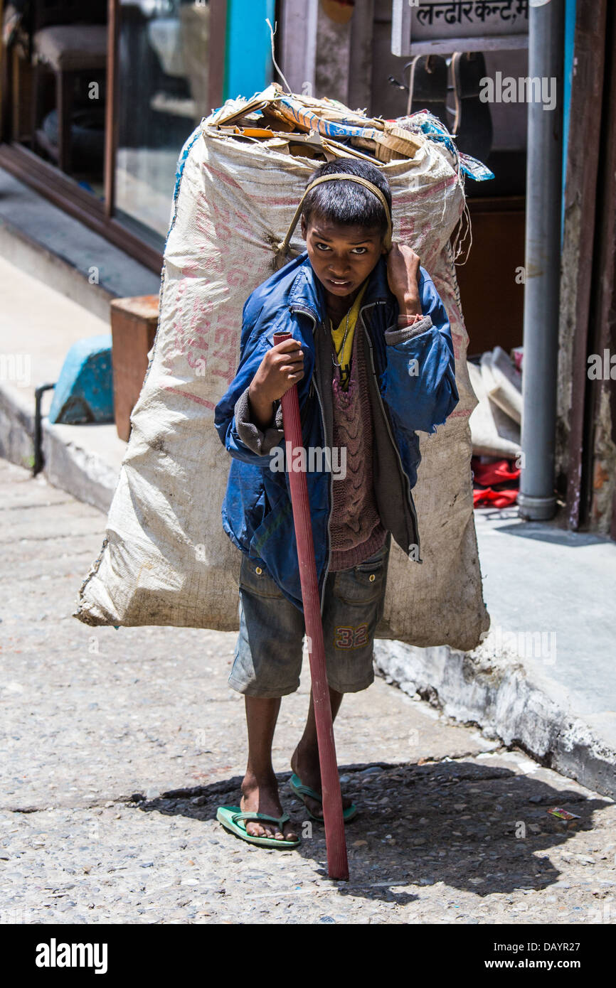 Child carrying heavy load hi-res stock photography and images - Alamy