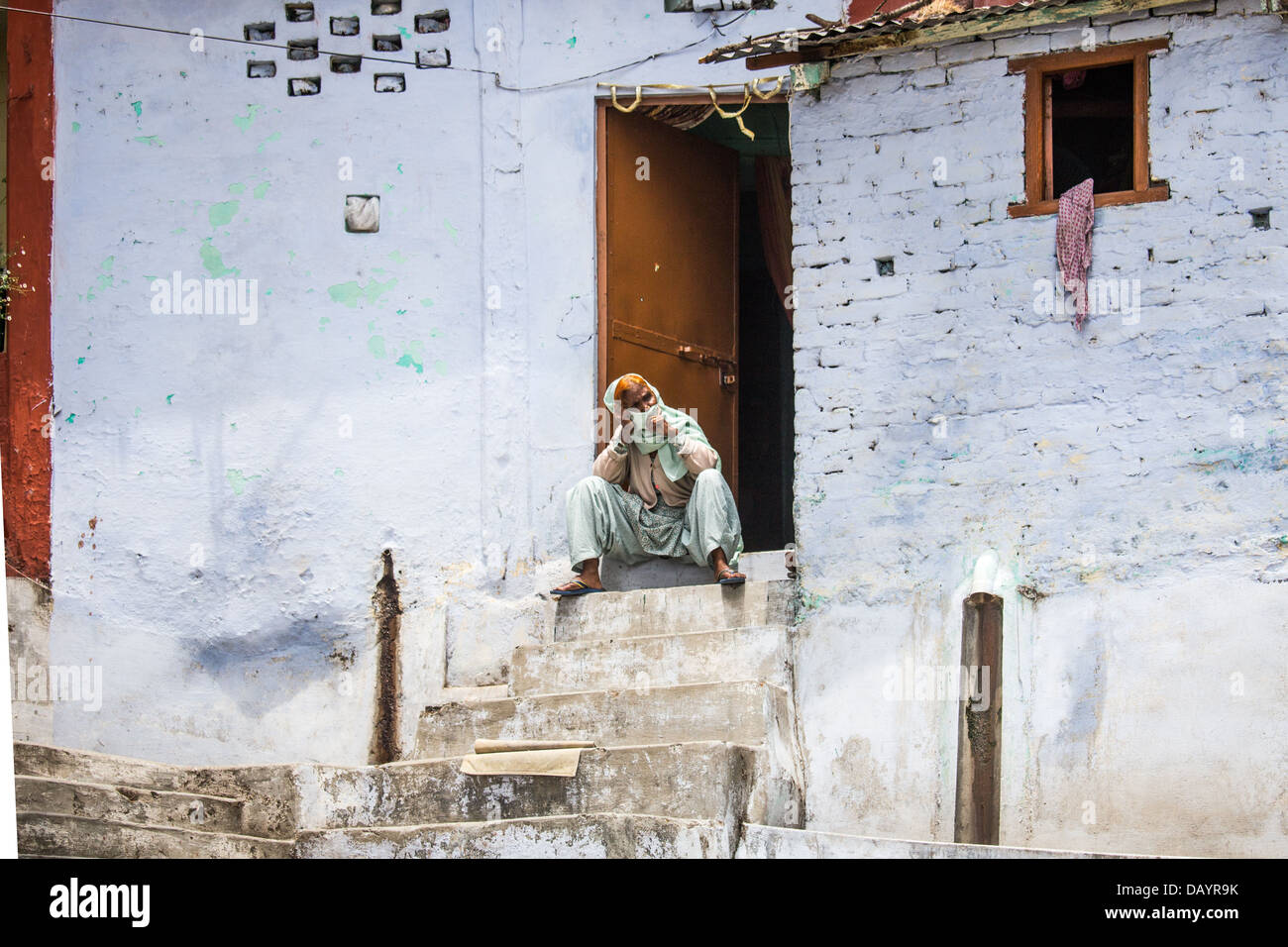 Old woman on a doorstep, Landour, Mussoorie, India Stock Photo - Alamy