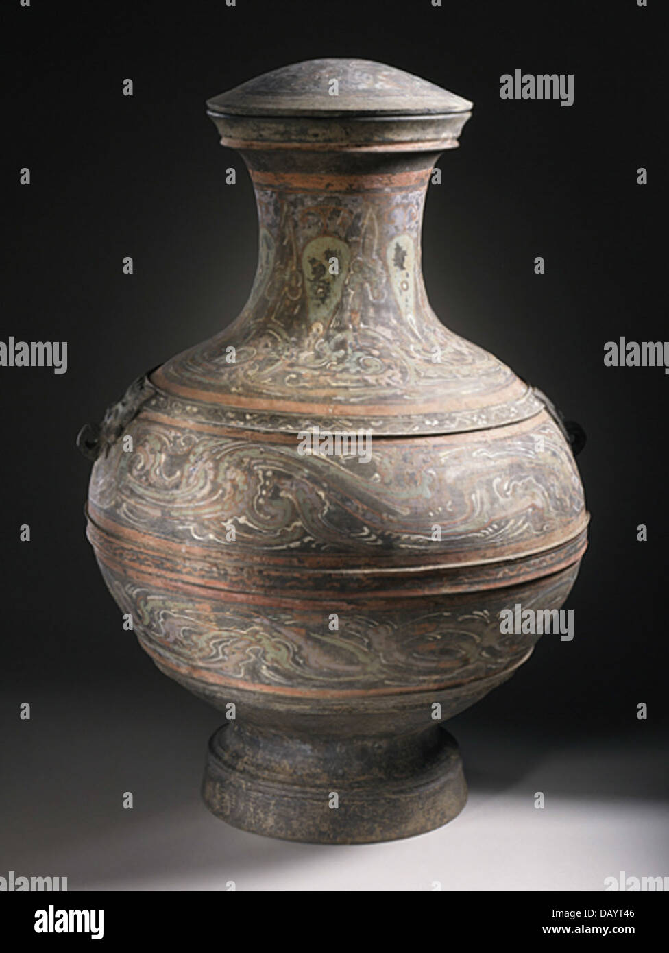 This funerary jar, featuring cloud scrolls, is a burial object made ...