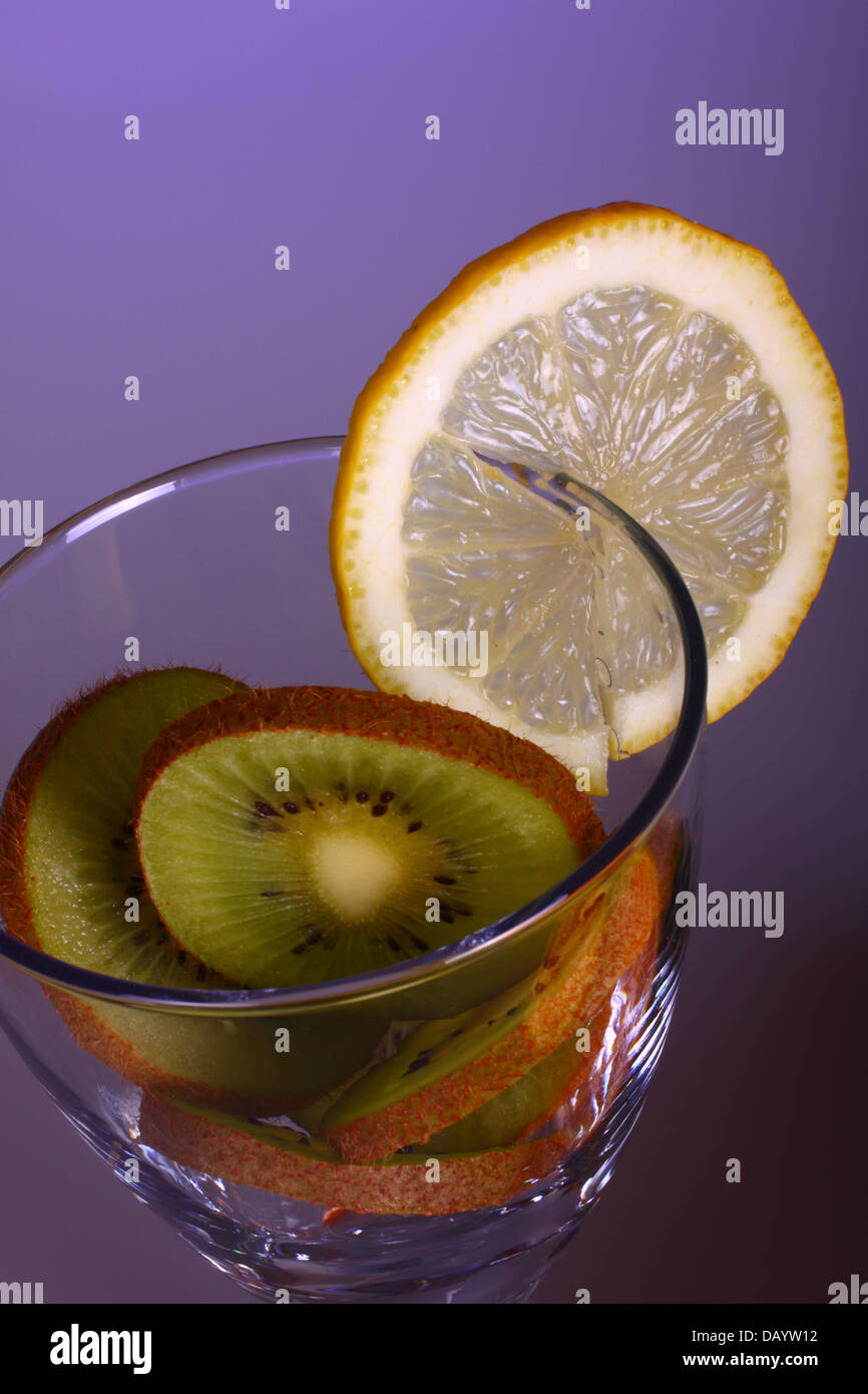 Fruit slices in a glass Stock Photo - Alamy