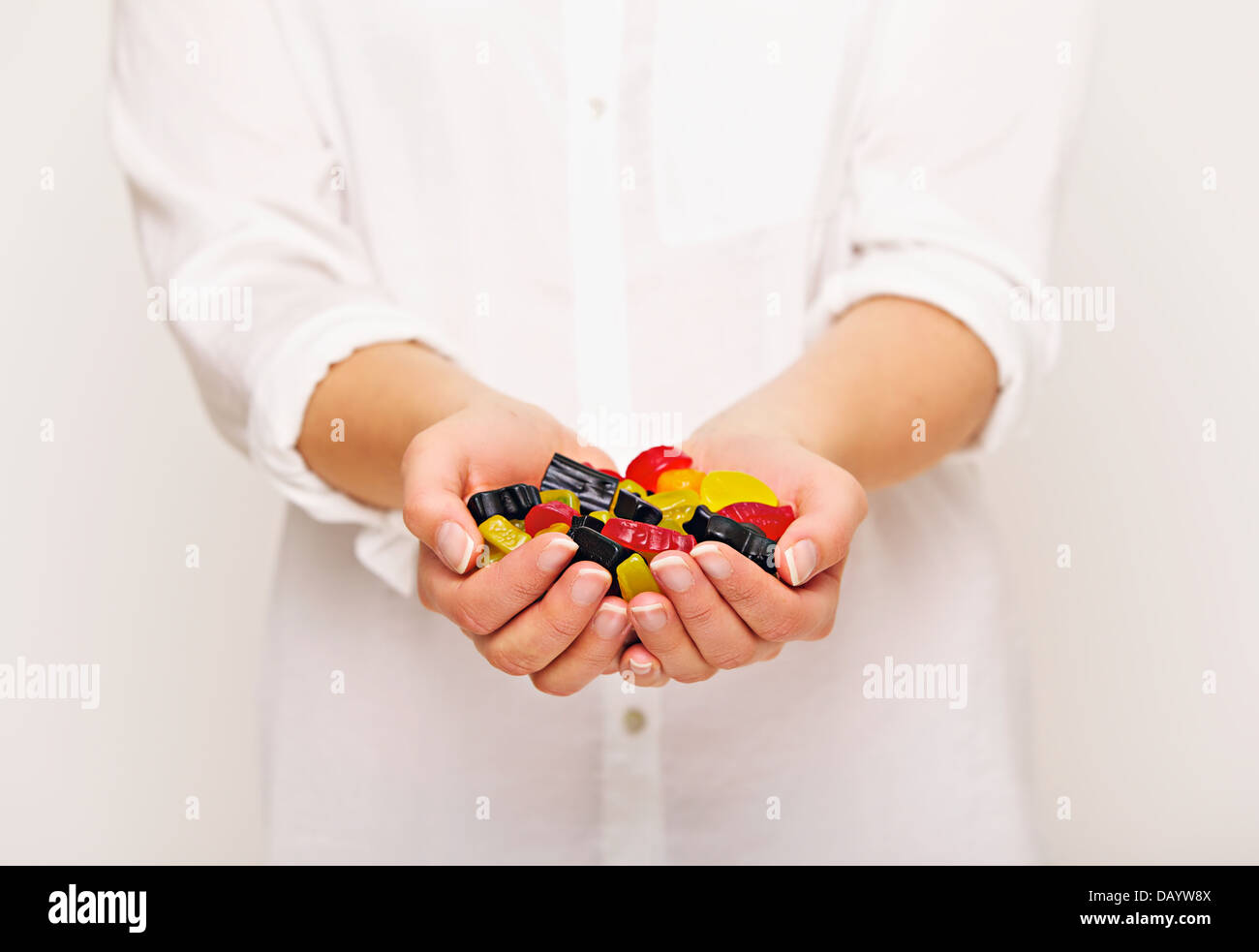Handful of colorful assorted candies Stock Photo - Alamy