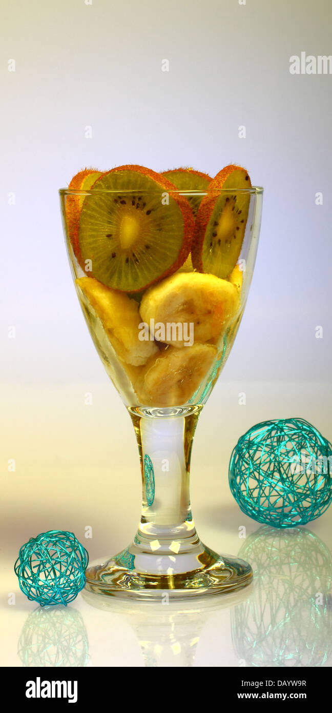 Fruit slices in a glass Stock Photo - Alamy