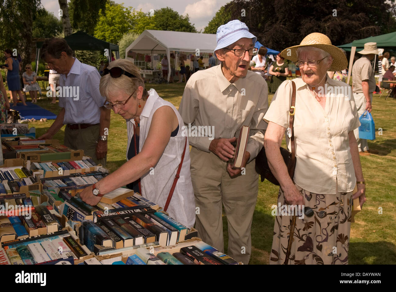 Book stall & elderly couple perambulating Worldham Village Fete ...