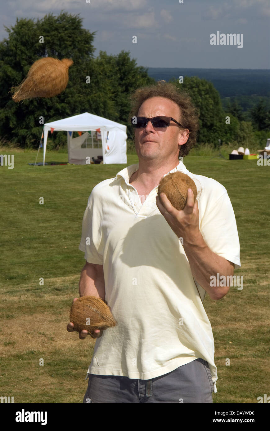 Man with coconuts hi-res stock photography and images - Alamy