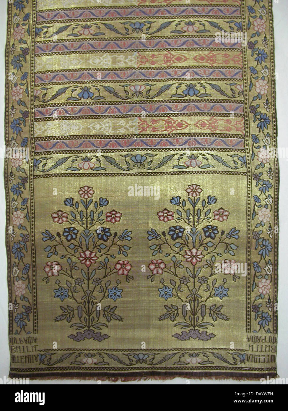 This man's sash is a fine example of traditional textile art ...