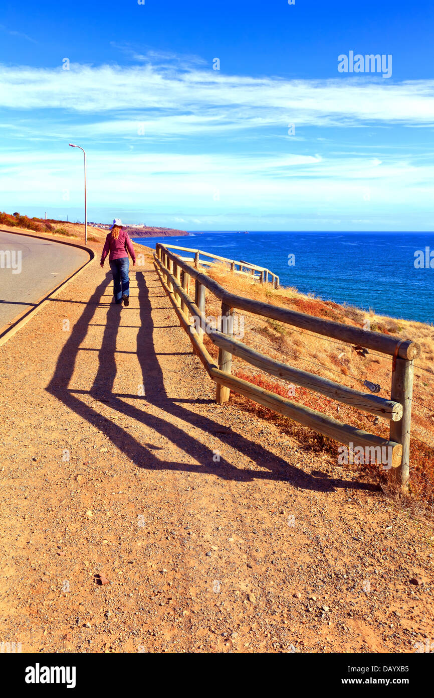 Woman walking along coastal footpath hi-res stock photography and ...