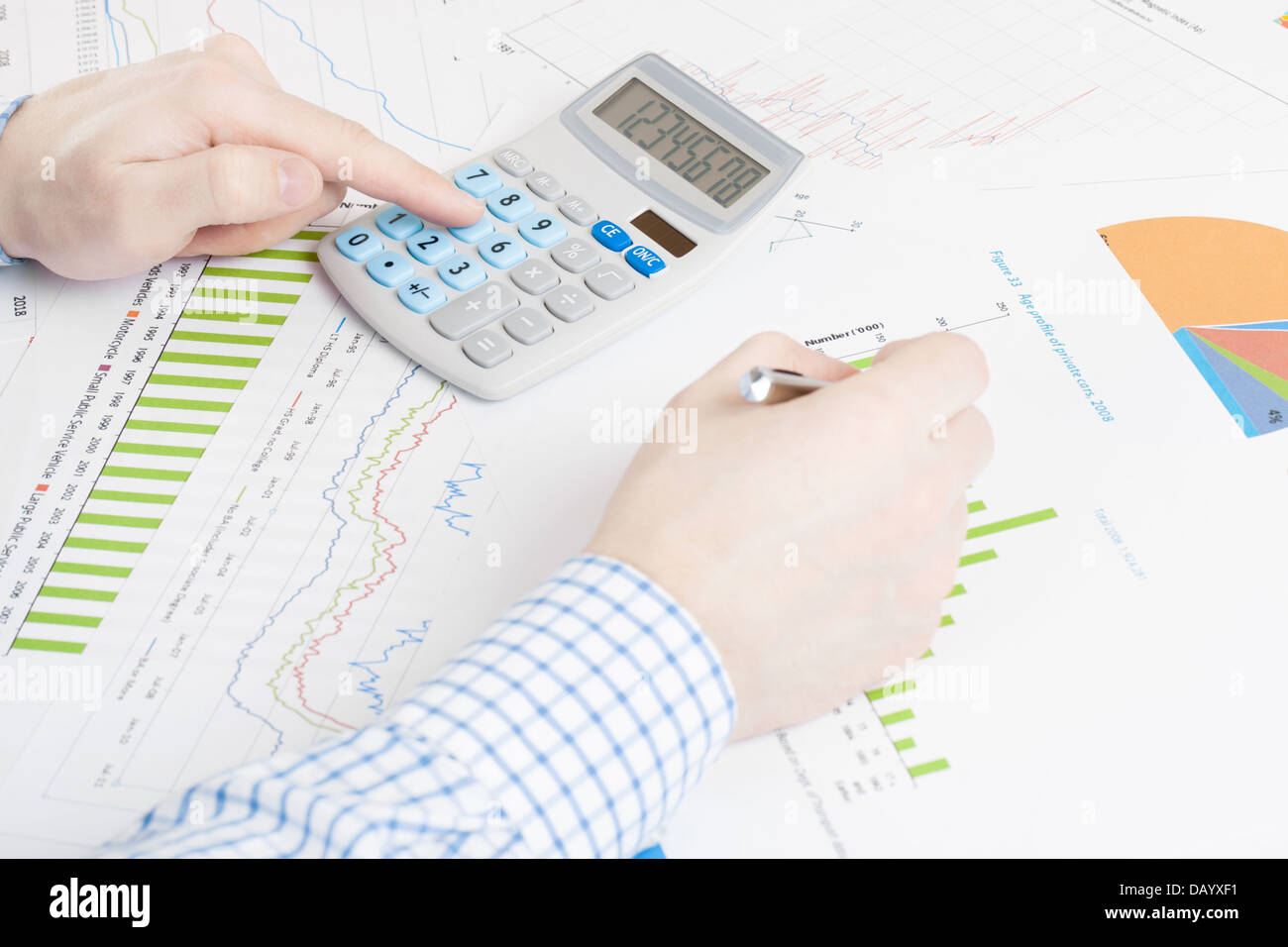 Businessman busy calculations desk hi-res stock photography and images ...