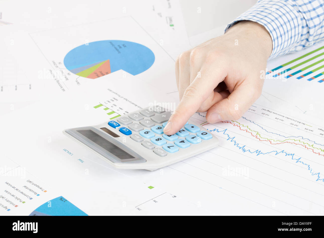 Business man busy doing some financial calculations Stock Photo - Alamy