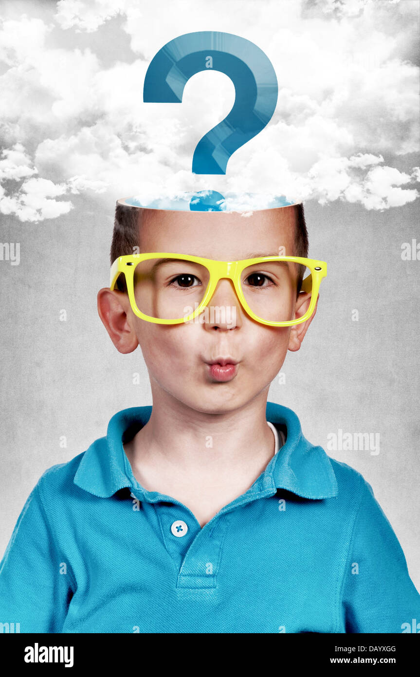 Whiz boy with question mark in his head Stock Photo - Alamy