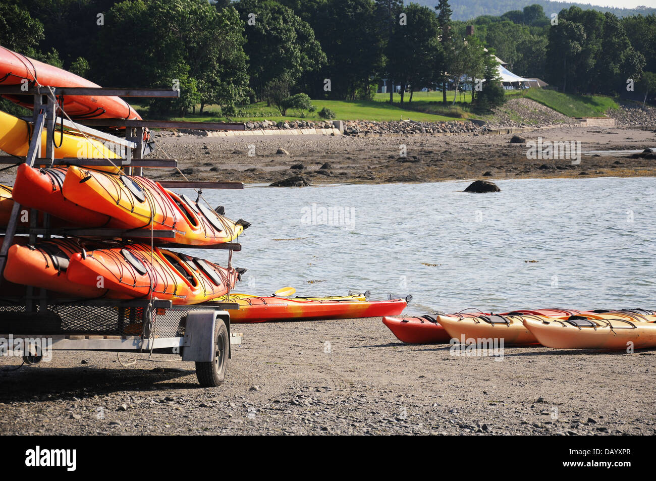 Kayaks on rocky beach hi-res stock photography and images - Alamy