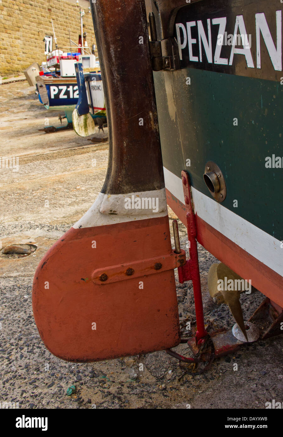 The sterns of a collection of shellfish boats at Sennen Cove, Cornwall ...